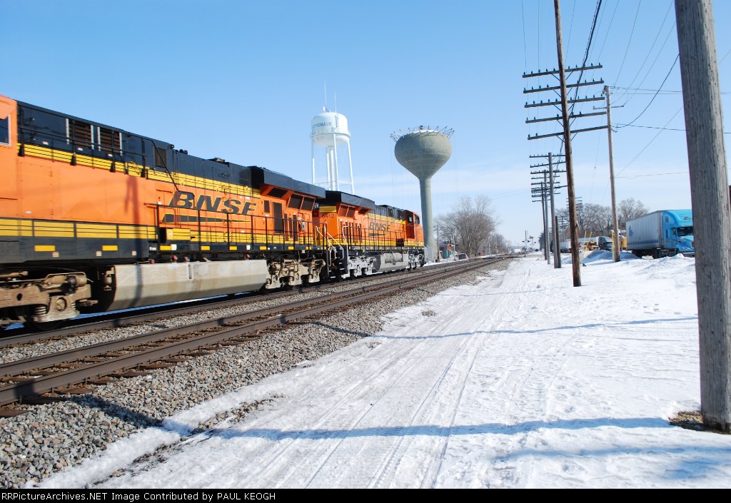 bnsf 6412 passes me as she rolls east towards Chicago, Il with a loaded coal train.
